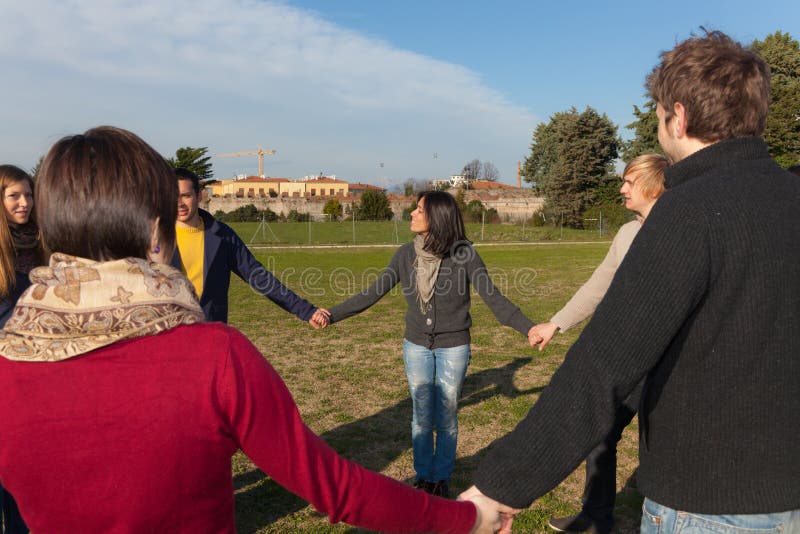 Group of People in circle stock photo. Image of holding - 18255562
