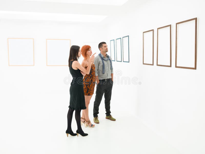 Group of People Contemplating Artworks Stock Photo - Image of ...