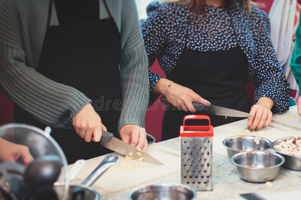 Group of People in a Cooking Class Studio, Adults Preparing Different ...