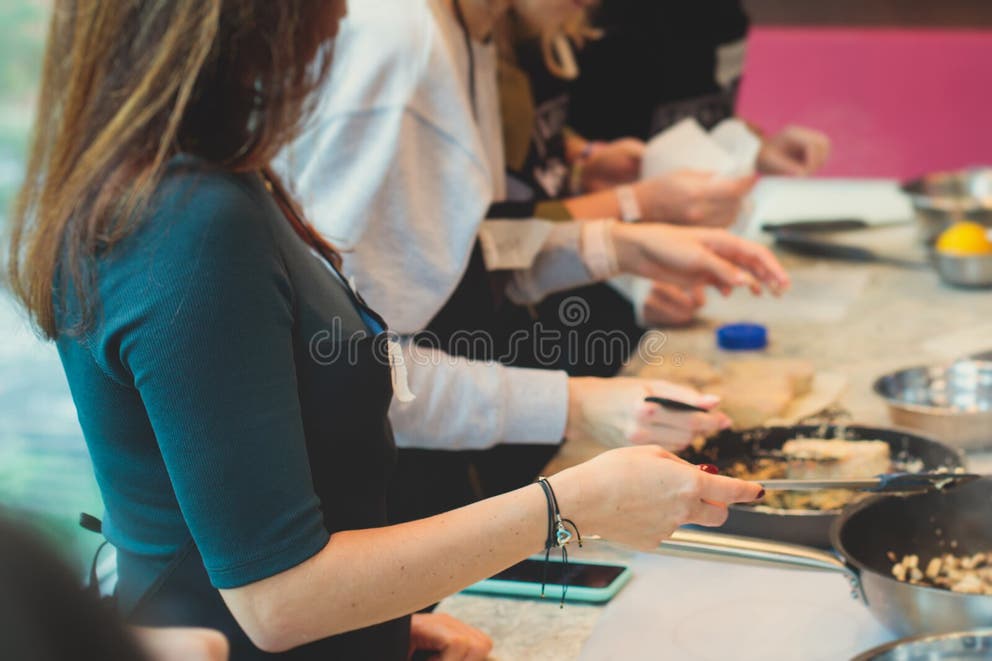 Group of People in a Cooking Class Studio, Adults Preparing Different ...