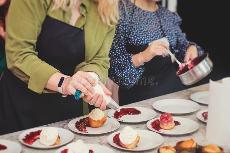 Group of People in a Cooking Class Studio, Adults Preparing Different ...