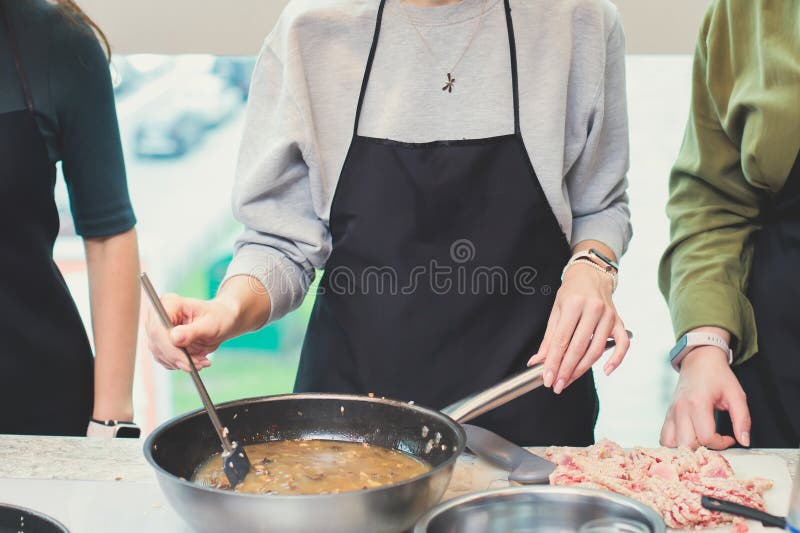Group of People in a Cooking Class Studio, Adults Preparing Different ...
