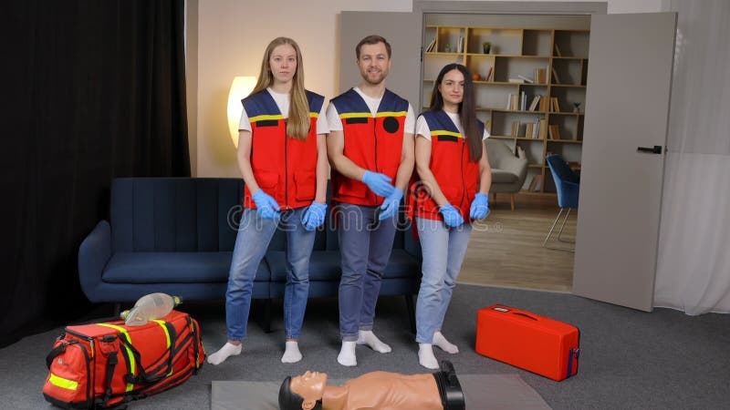 Group of People with Cpr Dummy Looking at Camera and Smiling after ...