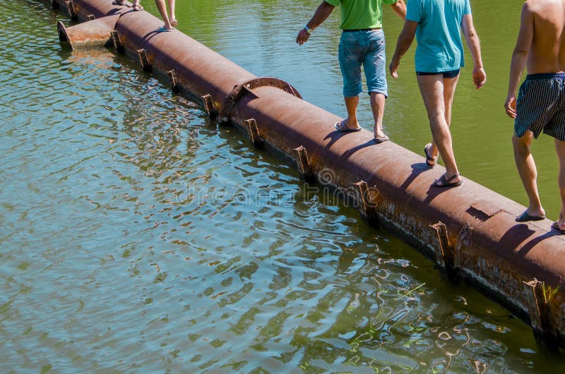 Through a Pipe Across the River Stock Image - Image of water, step ...