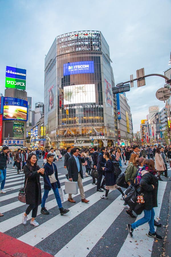 A Group of People Crossing at the Shibuya Intersection, Tokyo Japan ...