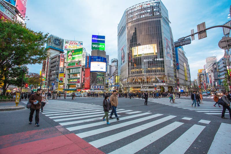 A Group of People Crossing at the Shibuya Intersection, Tokyo Japan ...