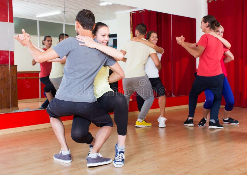 Group of People Dancing Salsa in Studio Stock Image - Image of group ...