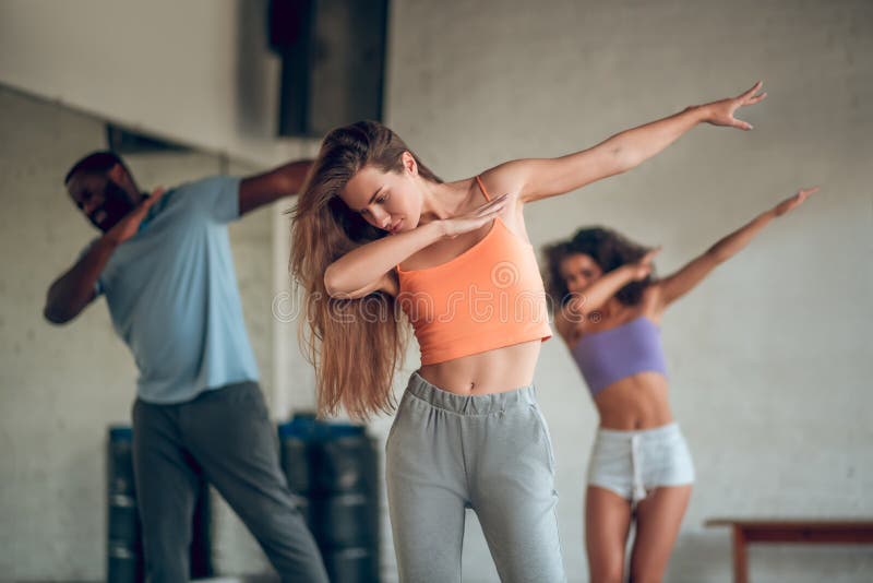 Group of People Dancing Synchronized Choreography Together Stock Photo ...