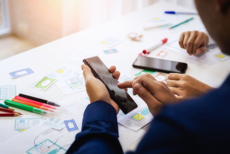 Group of People Designers Mobile Application Working Wireframe Sketch ...