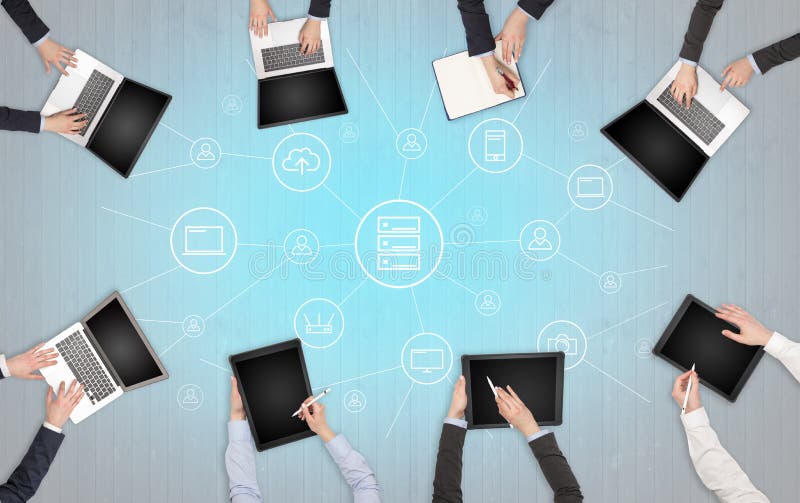 Group of People with Devices in Hands Working on Laptops and Tablets ...