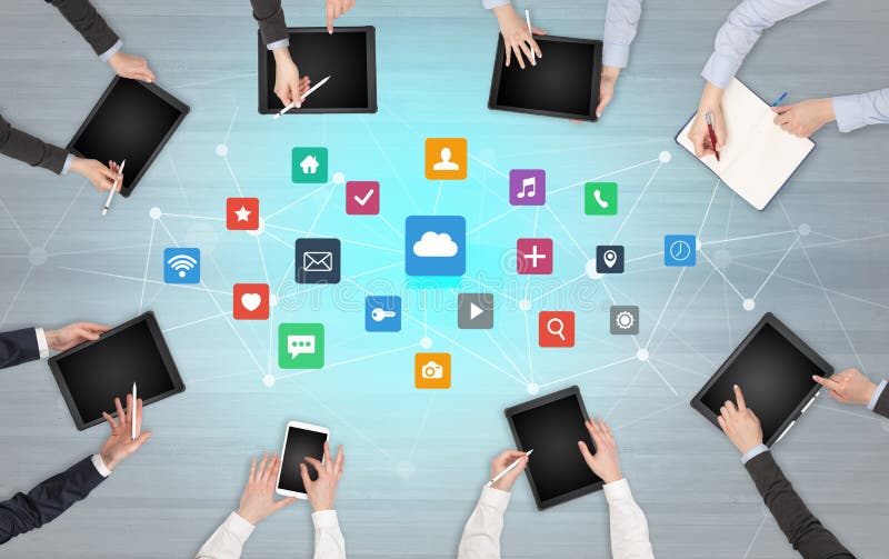 Group of People with Devices in Hands Working on Laptops and Tablets ...