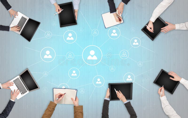 Group of People with Devices in Hands Working on Laptops and Tablets ...