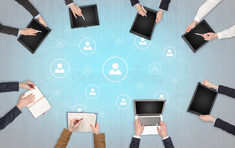 Group of People with Devices in Hands Working on Laptops and Tablets ...