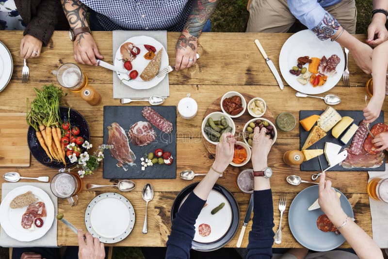 Group of People Dining Concept Stock Photo - Image of eating, meat ...