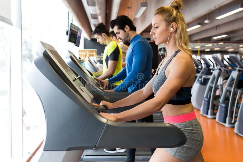 Group of People Doing Cardio Training in Gym. Stock Photo - Image of ...