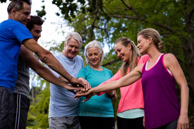 Group of People Doing a Hand Stack Stock Image - Image of mature ...