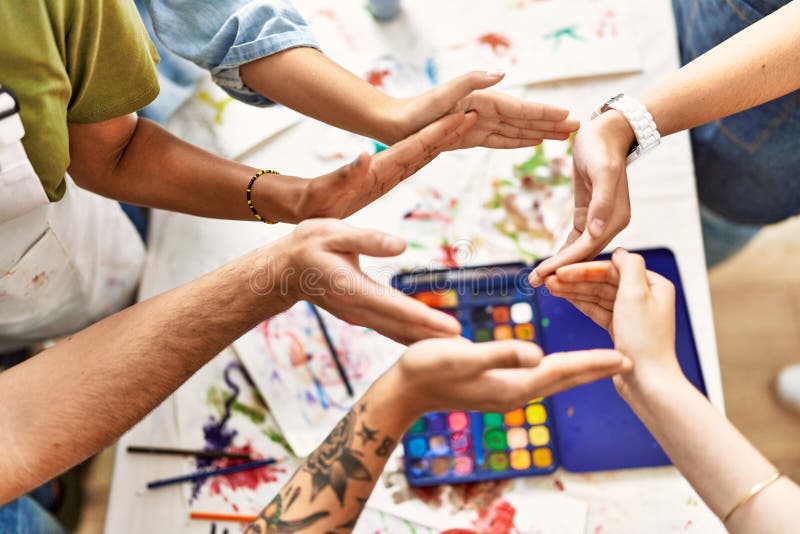 Group of People Doing Heart Sign with Hands Together at Art Studio ...