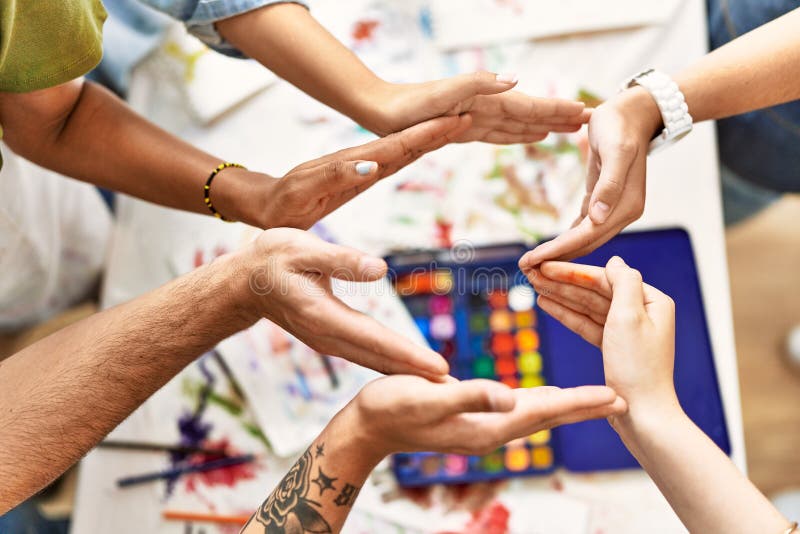Group of People Doing Heart Sign with Hands Together at Art Studio ...