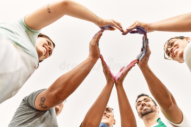 Group of People Doing Heart Sign with Hands Together at Art Studio ...