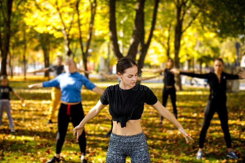 Group of People Doing Outdoor Workout Stock Photo - Image of female ...
