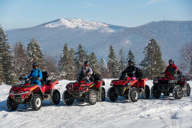 Group Of People Enjoying Sunset, On Off-road Four-wheelers ATV Bikes On ...