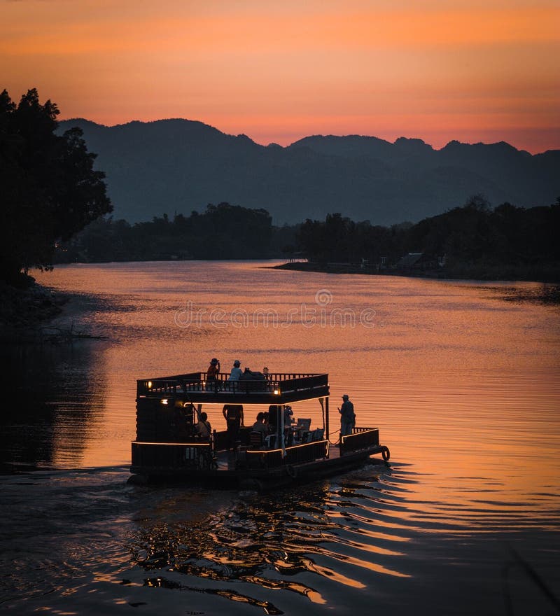 People, Enjoying the Evening at Sunset, on a Floating Raft, with a ...