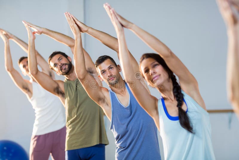 Group of people exercising stock photo. Image of indoors - 78642834