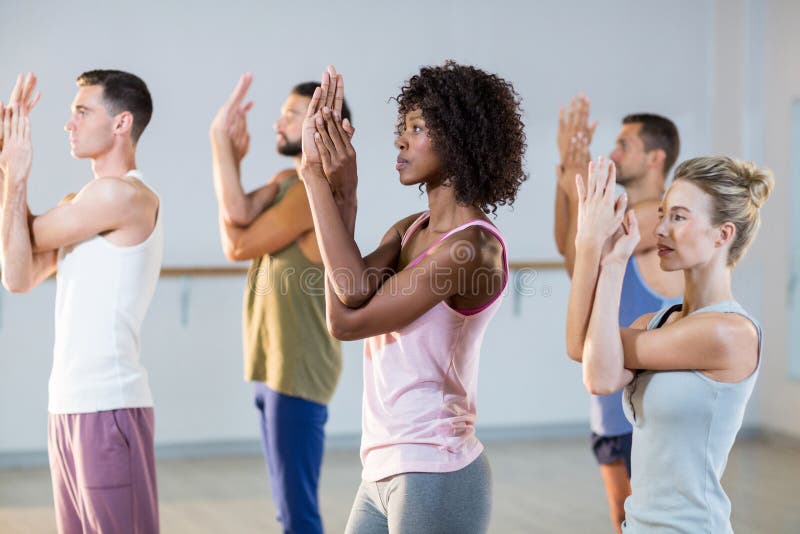 Group of people exercising stock photo. Image of concentration - 78747330