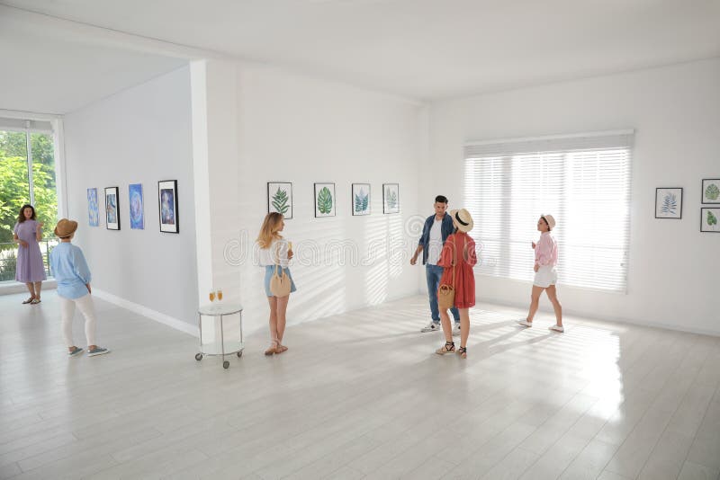 Group of People at Exhibition in Gallery Stock Photo - Image of indoors ...