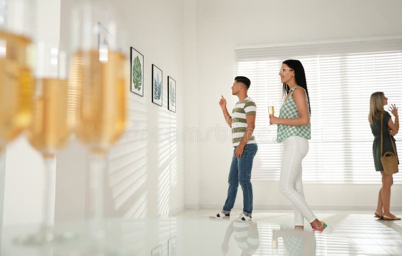 Group of People at Exhibition in Gallery Stock Photo - Image of group ...