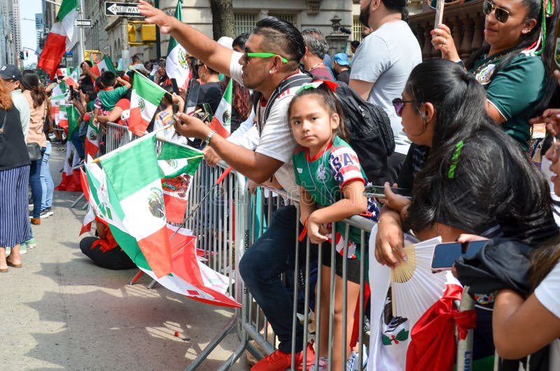 Group of People and a Female Child during the Mexican Independence Day ...