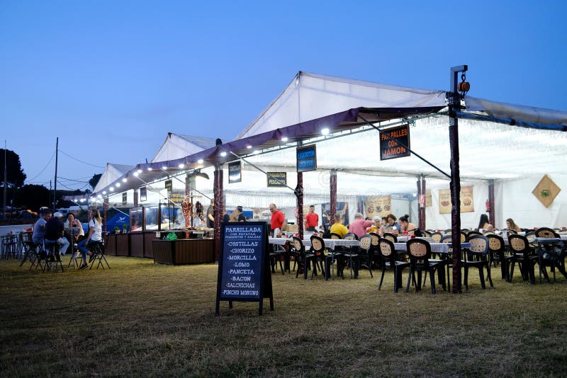 Group of People Gathered in a Temporary Restaurant for Outdoor Events ...