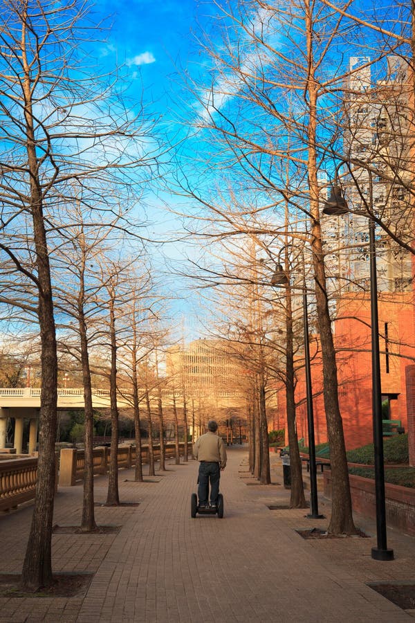 A Group of People Go on the Same Way, on Two Wheel Electric Devi Stock ...