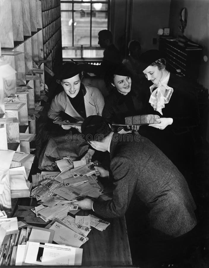 Group of People Going through a Pile of Mail Stock Image - Image of ...