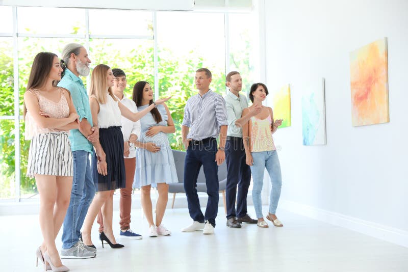 Group of People with Guide at Exhibition Stock Photo - Image of guide ...