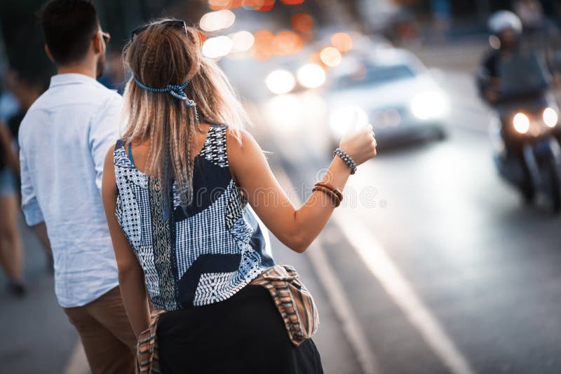Group of People Hailing Cab at Night in City Stock Photo - Image of ...