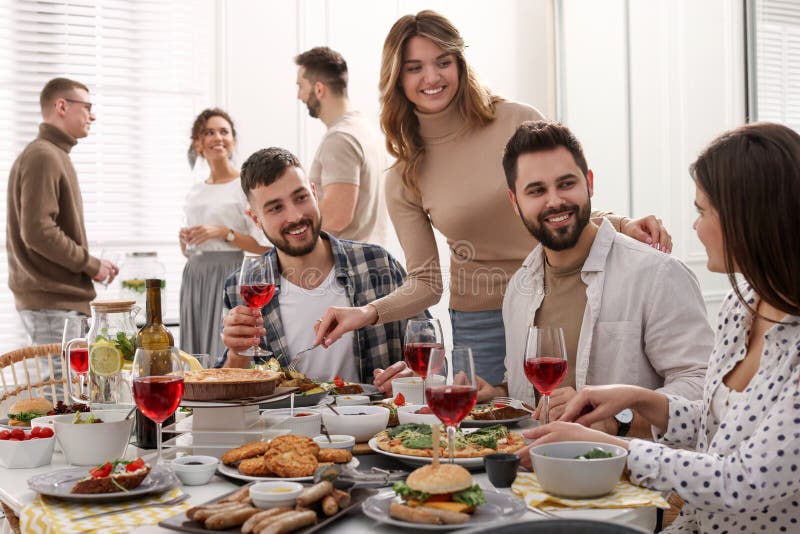 Group of People Having Brunch Together Indoors Stock Photo - Image of ...