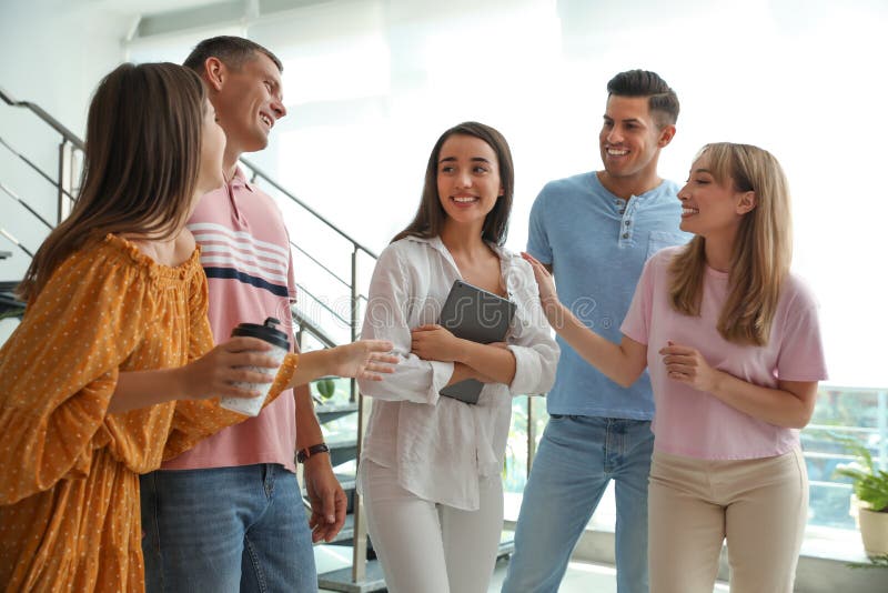 Group of People Having Conversation in Hall Stock Image - Image of ...