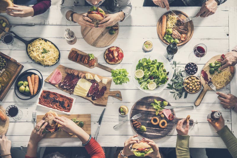 Group of People Having Meal Together Stock Image - Image of dinner ...