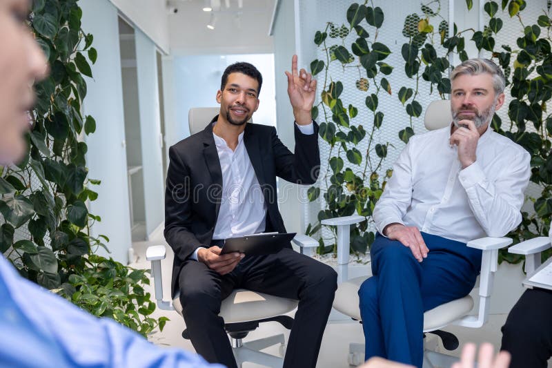 Group of People Having a Psycho Therapy Session and Looking Cheerful ...
