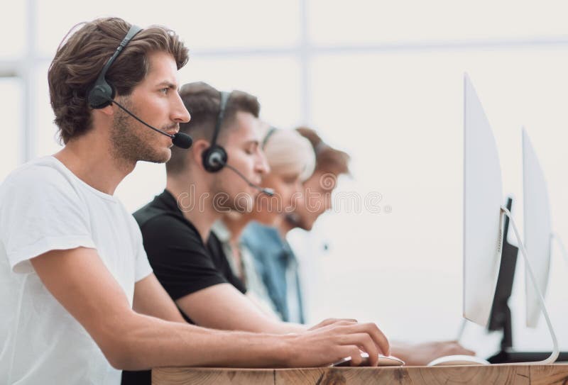 Group of People in the Headset Works on Personal Computers. Stock Image ...