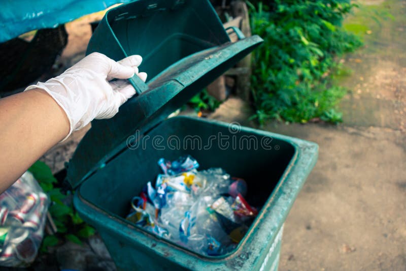 Group of People Help Garbage Plastic Collection for To Keep Clean Stock ...