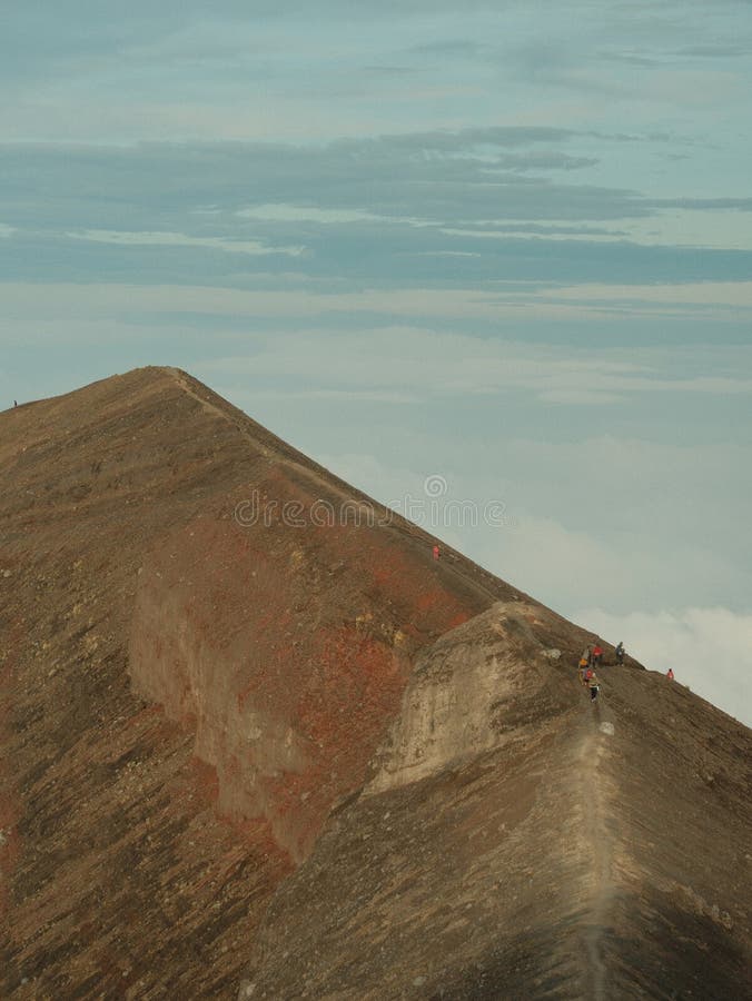 A Group of People are Hiking Up a Mountain Stock Photo - Image of ...