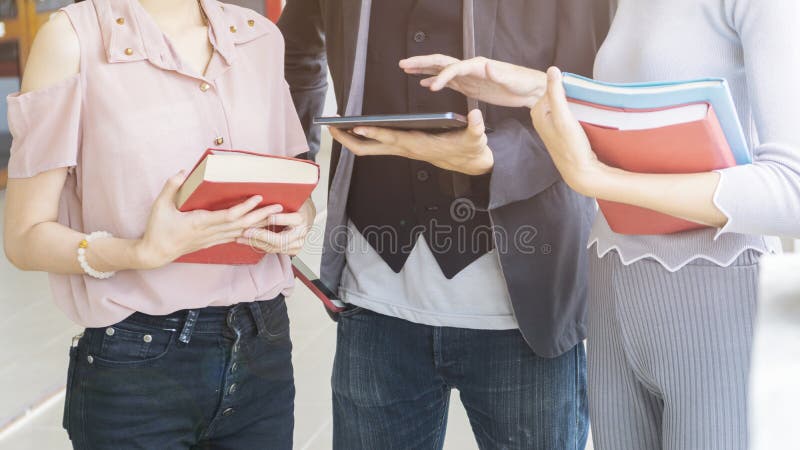 Group of People Hold the Book and Stationary Use and Touch. Stock Photo ...