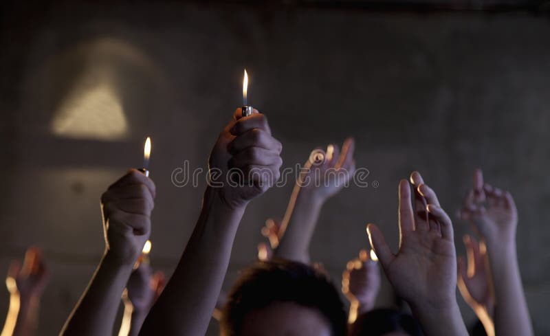 Group of People Holding Cigarette Lighters at a Concert Stock Image ...