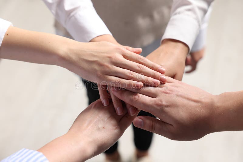 Group of People Holding Hands Together Indoors, Above View. Unity ...
