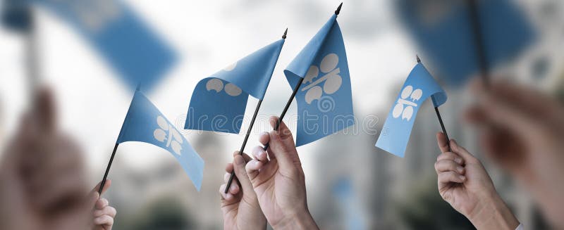 A Group of People Holding Small Flags of the Organization of the ...