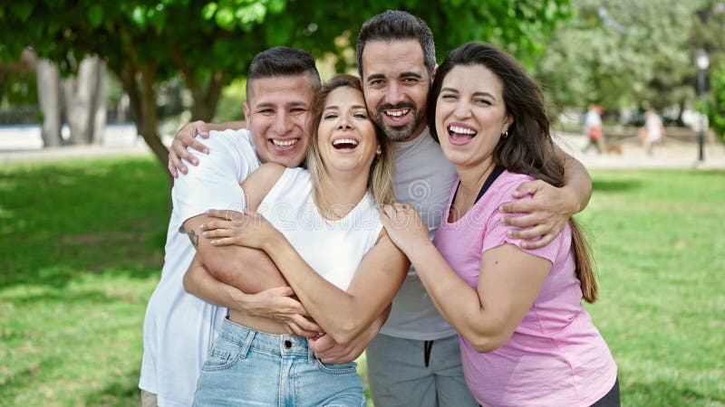 Group of People Hugging Each Other Smiling at Park Stock Video - Video ...