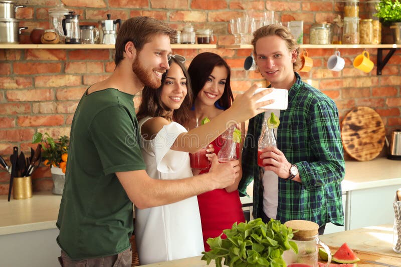 People at kitchen stock image. Image of group, cooking - 99765821
