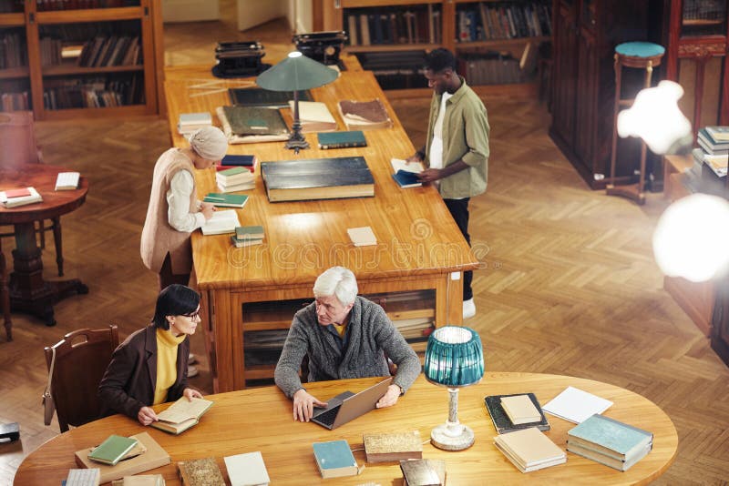Group of People in Library High Angle Stock Photo - Image of lifestyles ...